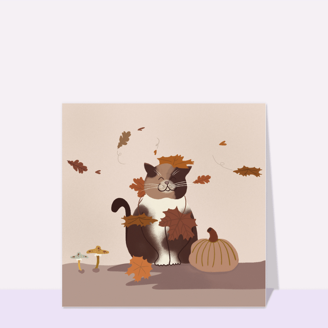 Chat joyeux sous les feuilles d'automne - Carte de novembre